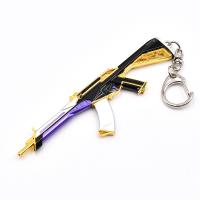 China Unisex Metal Gun Keychain Prime Vandal Crafts Gold Color Art Key Chain for sale
