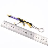 China Unisex Metal Gun Keychain Prime Vandal Crafts Gold Color Art Key Chain for sale