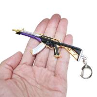 China Unisex Metal Gun Keychain Prime Vandal Crafts Gold Color Art Key Chain for sale