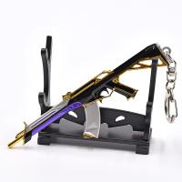 China Unisex Metal Gun Keychain Prime Vandal Crafts Gold Color Art Key Chain for sale