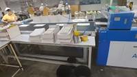 China Board Book Gluing Machine 600x300mm Partial Gluing for Special Shaped Lift Up Tab Children Books for sale