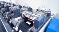 China HX480 Board Book Mounting Pasting Line 12 Stations 4200 pcs/h Partial Gluing System for sale