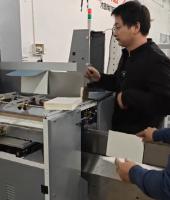 China Semi-Auto Cover Casing-In Machine 380x320mm Book Block Size PLC Touchscreen Hardcover Book Binding for sale