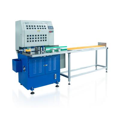 China Auto Double Head Hydraulic Round Corner Cutter With Auto Feeding And Collecting for sale