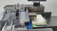 China HX480P Covering Stitching Trimming Machine with dedicated flat press and synchronized feeding system for exercise book for sale