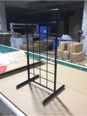 China Customizable Black Metal Peg Display Stand Floor Standing Display Rack With Feet for sale