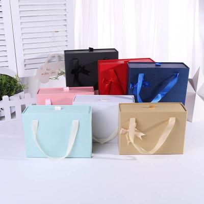 China ODM OEM Acceptable. Free Sample Portable Empty Slide Out Packing Rigid Drawer Type Gift Box Bag with Ribbon for sale