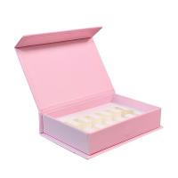 China Custom Pink Perfume Essential Oil Bottle Foam Magnetic Paper Boxes with Matt Lamination for sale