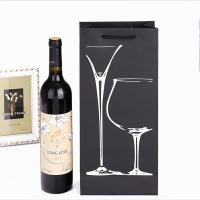 China Single Pack Wine Bottle Packaging Black Paper Bags with Custom Logo and Hot Foil for sale