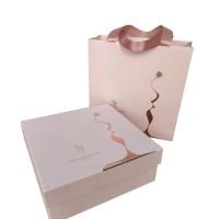 China Luxury Custom Logo Gold Foil Printed Kraft Paper Shopping Packaging Bag for Shoes Clothing for sale