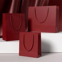 China Custom Clothing Shopping Bags Packaging Luxury Ivory Board Kraft Paper Shopping Gift Bag Custom Logo for sale