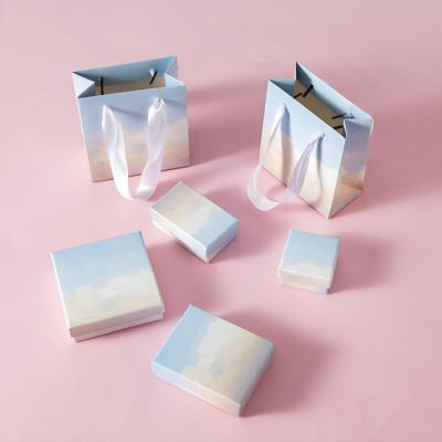 China Luxury Custom Logo Paperboard Jewelry Box Rings Earrings Necklaces Bracelets Rigid Base Jewellery Packaging for sale