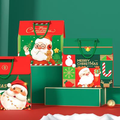 China Custom Luxury Christmas Gift Box Packaging With Handle 157g Art Paper 1000g Cardboard for sale