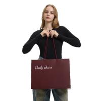China Custom Elegant Large Paper Shopping Bags Dresses Personalized Logo Design Recycled Fashion Bulk Luxury Branded Carry Bags For Stores for sale