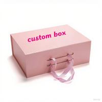 China Luxury Pink Printed Magnetic Gift Boxes Ribbon Handle Custom Logo Rigid Cardboard Packaging For Clothing for sale