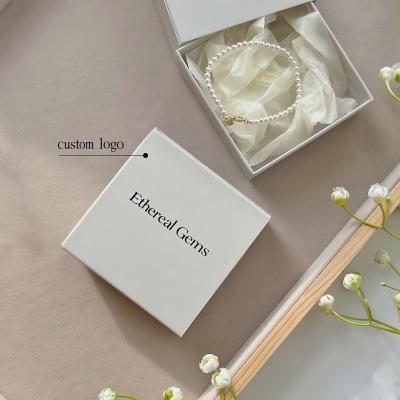 China Luxury Wedding Jewelry Gift Box Custom Logo Printed Drawer Storage for Bridal Rings, Earrings, Necklaces for sale