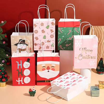 China Christmas Kids Gift Bags Recycled Paper Santa Snowman Xmas Party Favors Wholesale Holiday Goodie Bags for Gifts for sale
