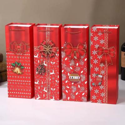 China Customized Paper Bags Printed with Your Own logo Christmas Paper Gift Bags for Wine Packaging for sale