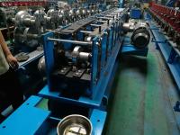China Door Slide Rail Roll Forming Making Machine Iron Steel Rolling Shutter Door Slats Roll Forming Machine Prices for sale