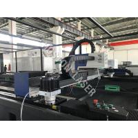 China 1000W Laser Power CNC Fiber Laser Cutter with 10mm Iron Enclosed Cover and 1500mm*4000mm Cutting Area for sale