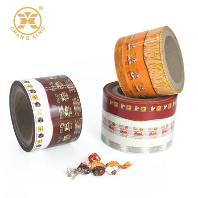 China PET Twist Film Packaging Roll 20-50 Microns for Candies Chocolates Sweets with Gravure Printing Food Grade for sale
