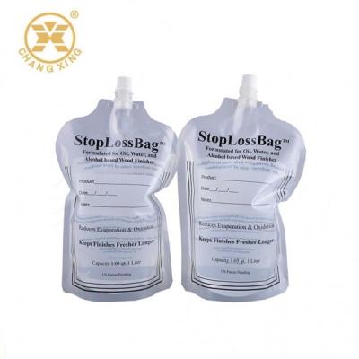 China VMPET 2kg Spouted Liquid Plastic Laminated Foil Standing Pouch with Central Spout Design for sale