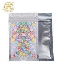 China 20 Microns VMPET PE Heat Sealable Food Packaging Bags - 92mm x 128mm Stand Up Pouches with Custom Logo for sale