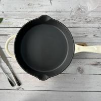 China Cast Iron Enamel Coated Frying Pan Non Stick Durable Black Interior for sale