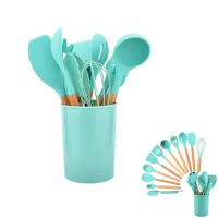 China Kitchen Gadgets Silicone Spatula Spoon With Non Stick Surface for sale