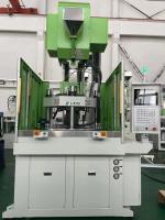 China Three Tie Bars Vertical Injection Molding Machine With Rotary Table for sale