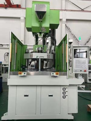 China Three Tie Bars Vertical Injection Molding Machine With Rotary Table for sale