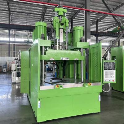 China Green Color Vertical Injection Molding Machine With Rotary Table for sale
