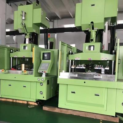 China Hybrid Injection Molding Machine 120 Ton Magnetism Material Car Glass for sale