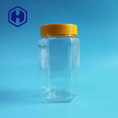 China Bulk 670ml Transparent Hexagon Wide Mouth PET Plastic Food Packaging Jar with Lid for sale