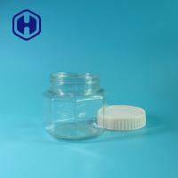 China Small Hexagonal 190ml Empty Plastic Food Jars with Lids for Sweets Peanuts Rice Beans Packing for sale