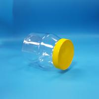China Transparent Airtight Wide Mouth PET Plastic Candy Jar 900ml 85mm Neck Yellow Screw Lid for sale