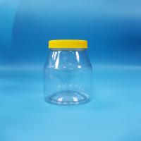 China Transparent Airtight Wide Mouth PET Plastic Candy Jar 900ml 85mm Neck Yellow Screw Lid for sale