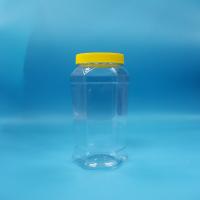 China Food Grade Hexagonal Clear PET Candy Jar 1120ml with Yellow Screw Cap for sale
