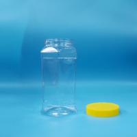 China Food Grade Hexagonal Clear PET Candy Jar 1120ml with Yellow Screw Cap for sale
