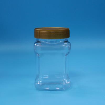 China Food Grade PET Plastic Jar 450ml 75mm Unique Shape Airtight Screw Lid Candy Container for sale