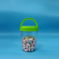 China Transparent PET Plastic Food Jar 820ml 85mm Diameter with Green Handle Cap for Candy Storage for sale