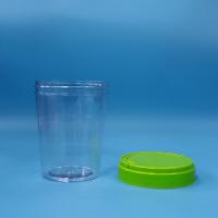 China Transparent PET Plastic Food Jar 820ml 85mm Diameter with Green Handle Cap for Candy Storage for sale