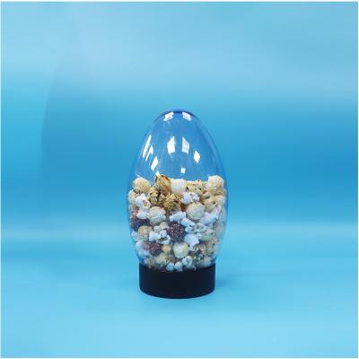 China Unique Egg-Shaped Plastic Candy Jar 1270ml Food Grade PET Screw Lid Airtight Leak Proof for sale