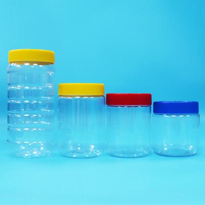 China Round PET Transparent Plastic Jars 340ml 690ml with Screw Lids for Chocolate Sauce Pistachio Butter for sale