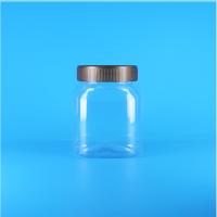China Small PET Clear Empty Airtight Plastic Candy Nuts Food Packing Jars Screw Caps for sale
