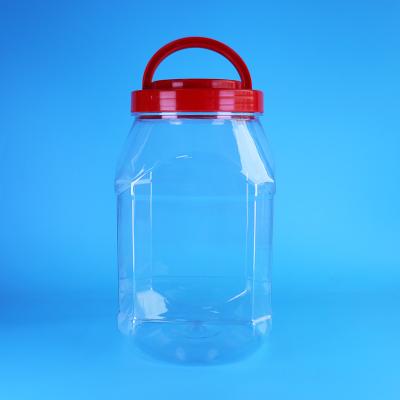 China Large 2100ml Capacity Food Grade PET Plastic Candy Jar with Red Handle Lids for sale