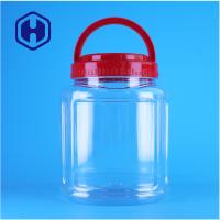 China Food Grade Clear PET Nut Storage Jar Handle Lid Manufacturer For Almond Peanut Cashew Packaging for sale