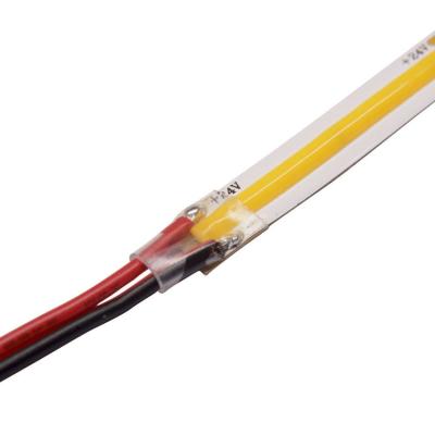 China Continuous 24v Cob Strip Light Warm And Cold White Cct Turnable for sale