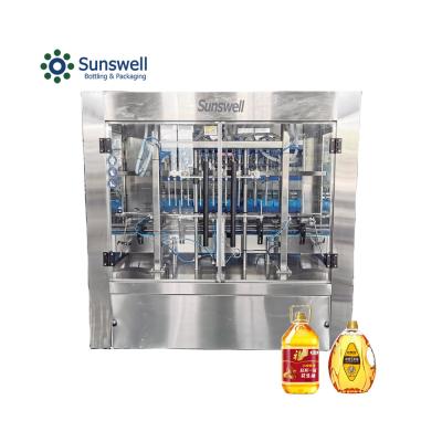 China Coconut Oil Bottle Filling Machine 20000 BPH Production Line with Weight-Based Precision Filling and Automatic Capping for sale