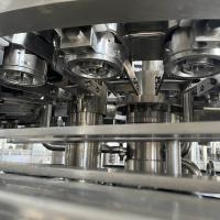China Automatic Rotary Carbonated Drink Filling Seaming Monoblock for Aluminum Cans 1500-18000 Cans per Hour for sale